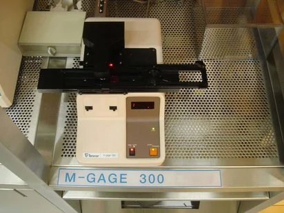 KLA / TENCOR M-Gage 300 晶圆测试仪 用于销售价格 #9352954, 2001 > 从 CAE 购买